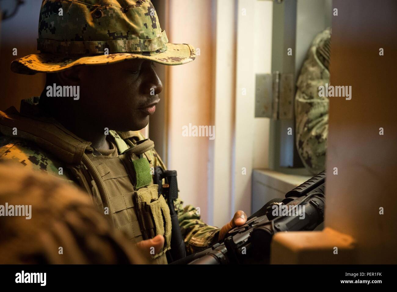 Yeoman 1st Class Marlon Bellamy, assigned to Coastal Riverine Group ONE ...