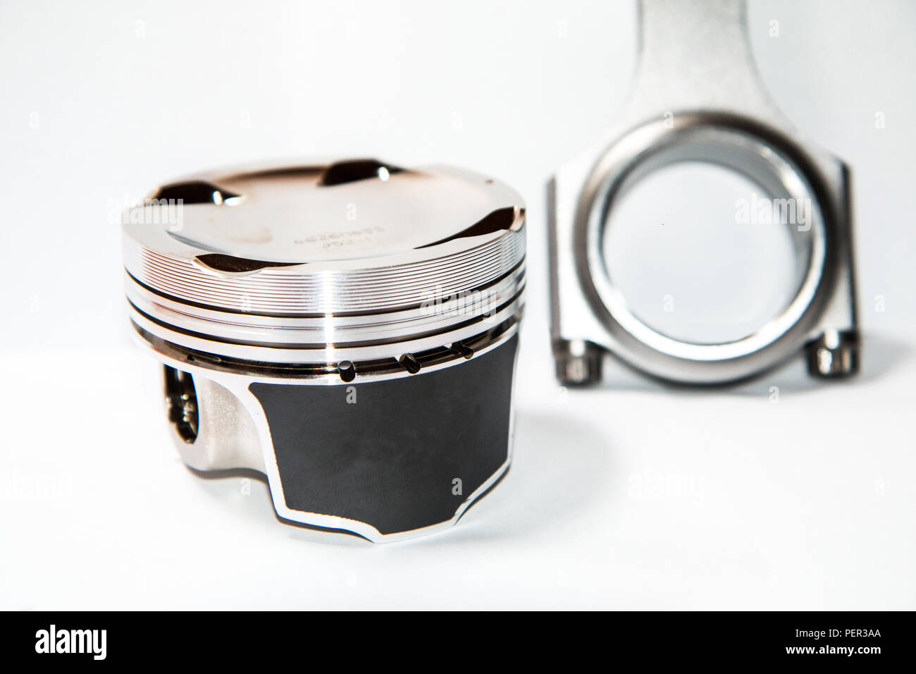 A picture of the light forged sport and racing piston and connecting ...