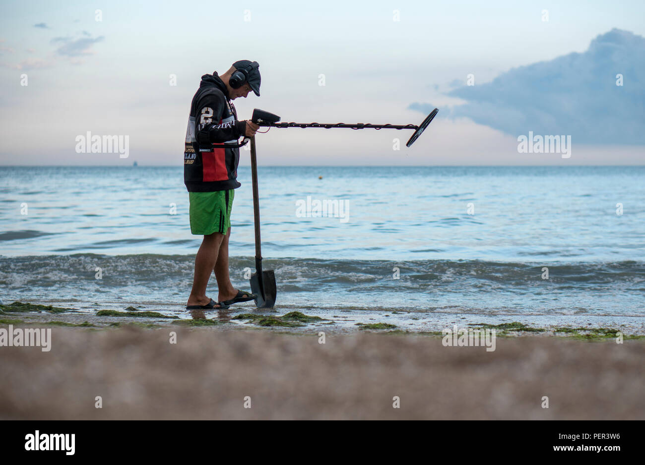 Man holding metal detector hi-res stock photography and images - Alamy