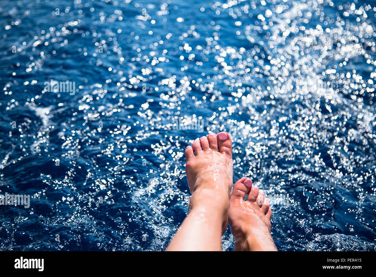 Female enjoy sea. female legs in the blue sea water. Happiness ...