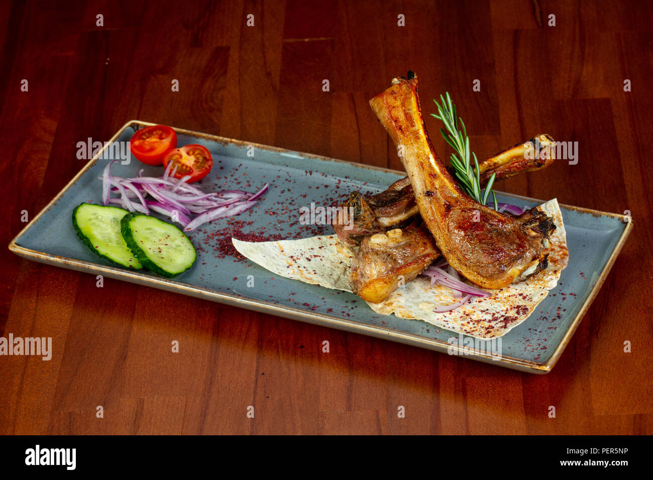 Lamb barbeque with rosemary and caucasian bread Stock Photo - Alamy