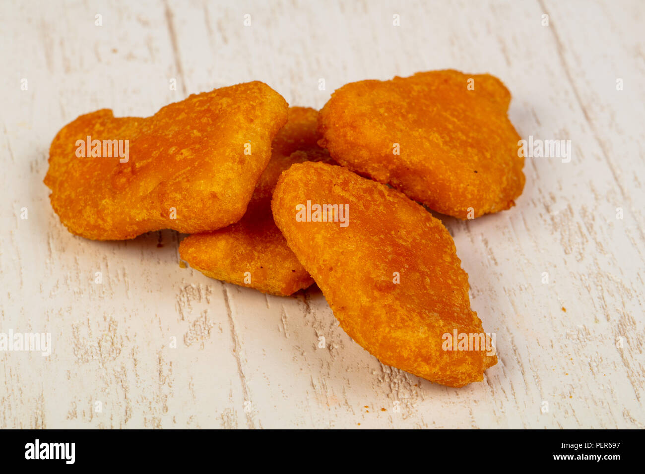 Crispy tasty golden chicken nuggets Stock Photo - Alamy