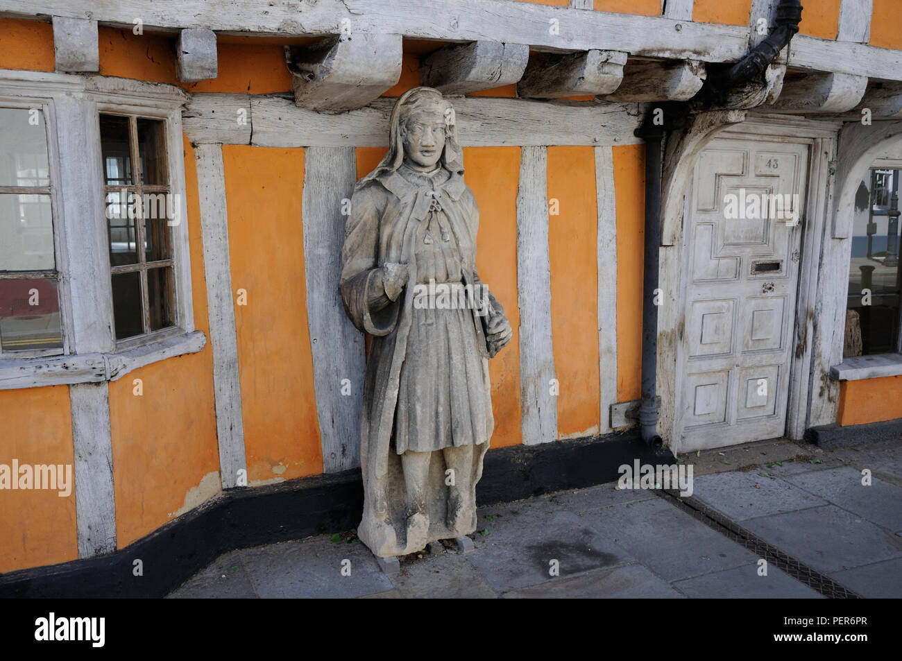 Statue under the overhanging upper storey of St Nicholas Hall, Hertford ...