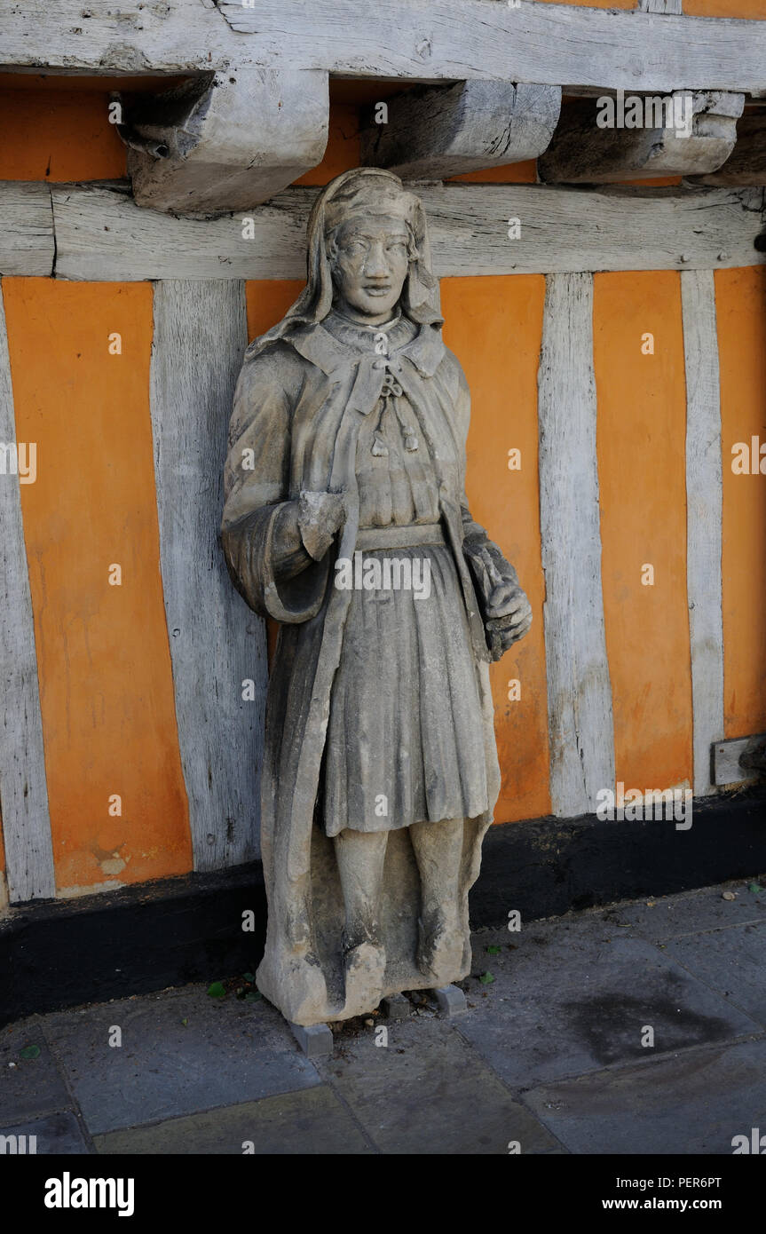 Statue under the overhanging upper storey of St Nicholas Hall, Hertford ...