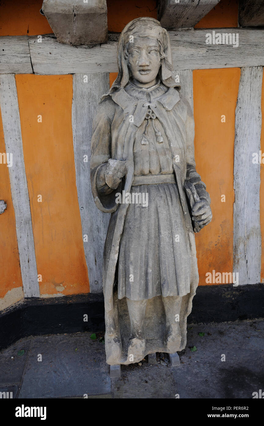 Statue under the overhanging upper storey of St Nicholas Hall, Hertford ...