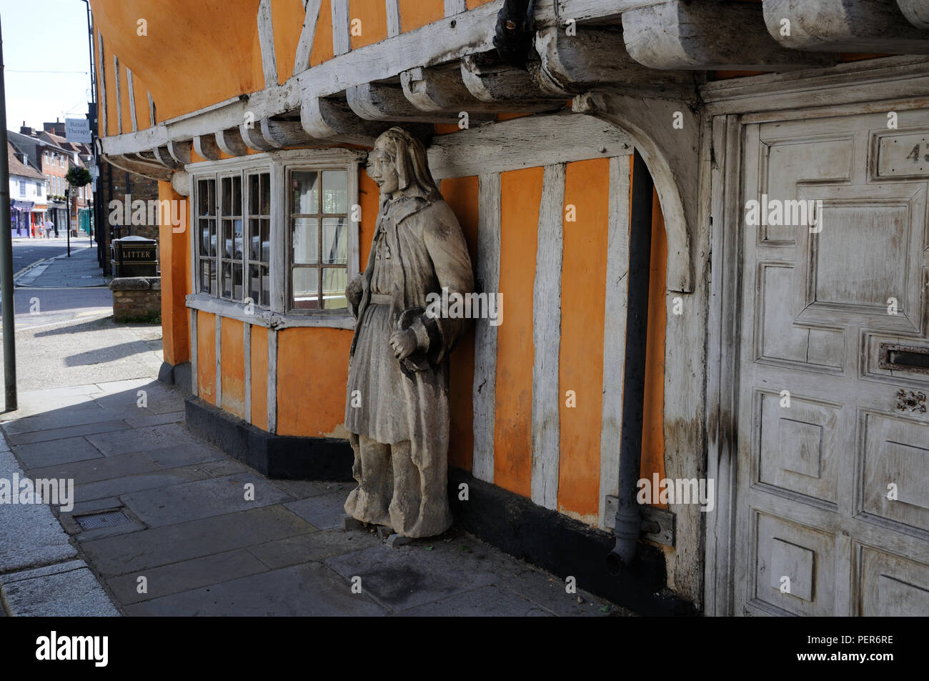 Statue under the overhanging upper storey of St Nicholas Hall, Hertford ...