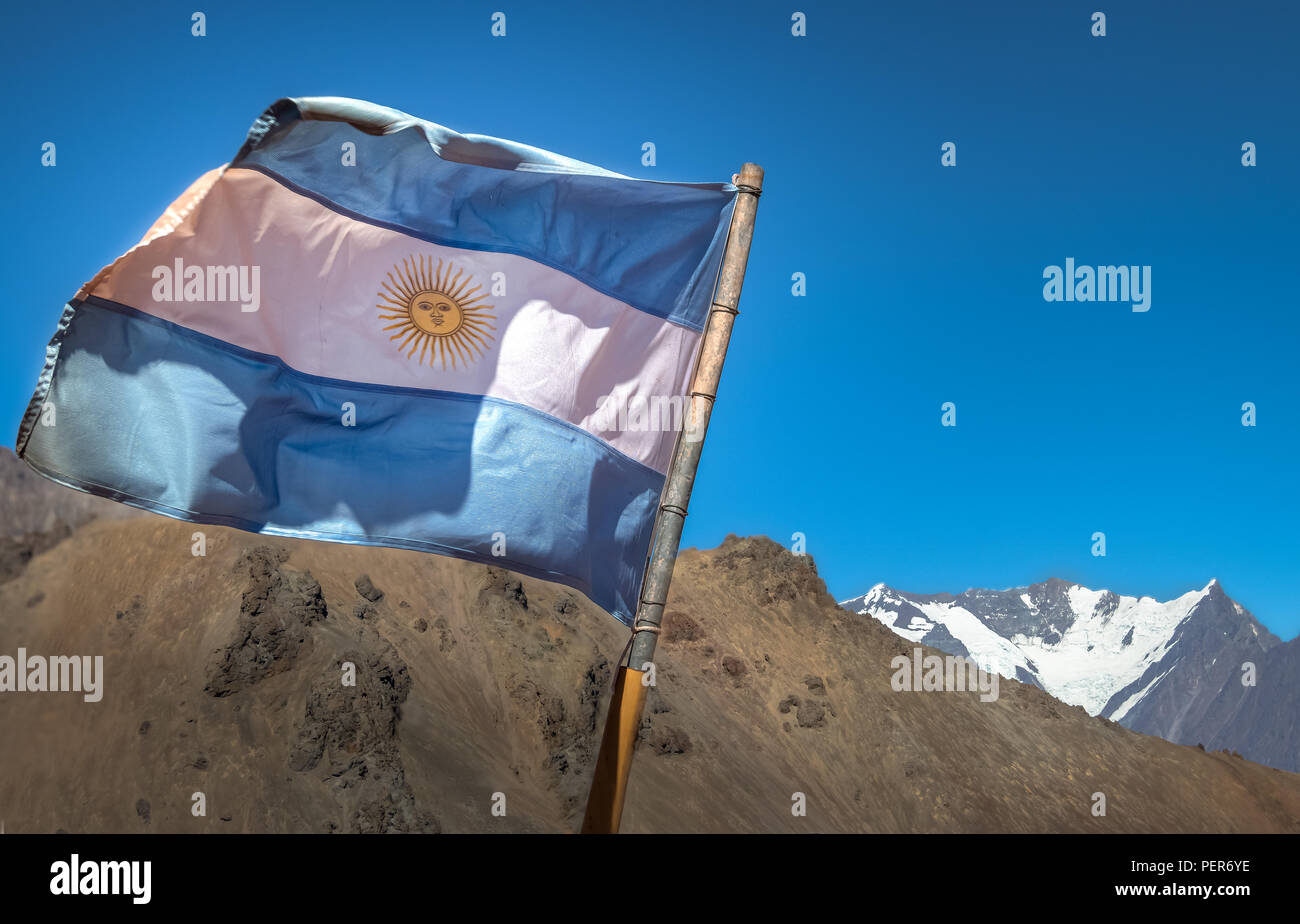 Argentina flag with Nevado Juncal Mountain on background in Cordillera ...