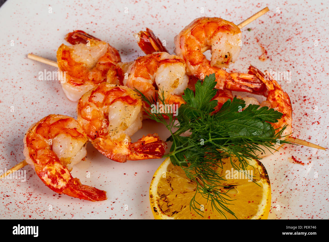 Tasty tiger prawn with garlic sauce Stock Photo - Alamy