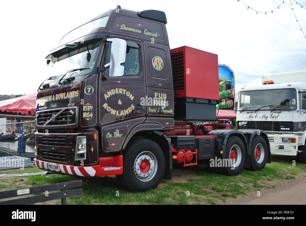 a Volvo FH12 lorry with generator supplying power to nearby fairground ...