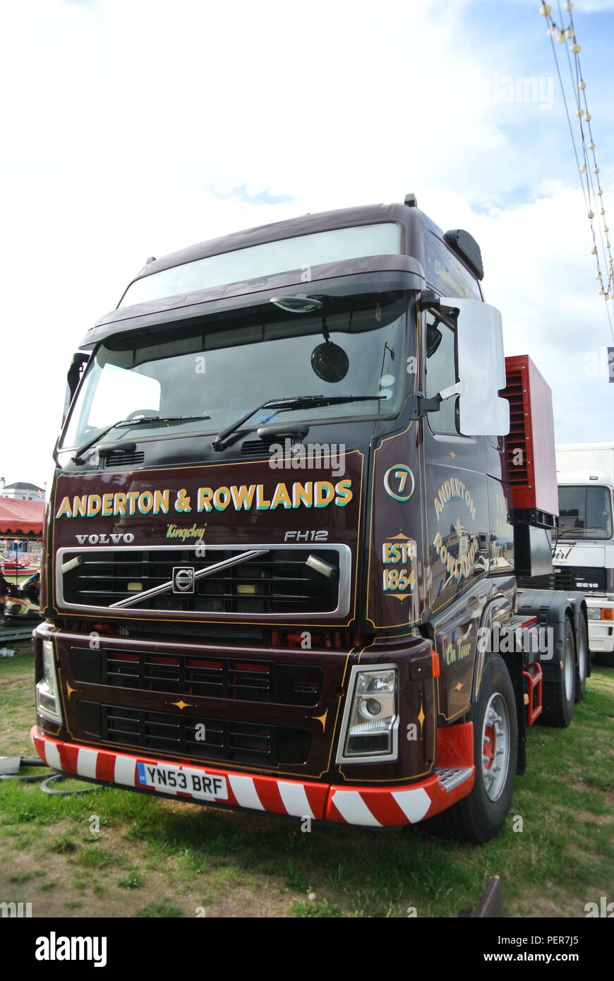 a Volvo FH12 lorry with generator supplying power to nearby fairground ...