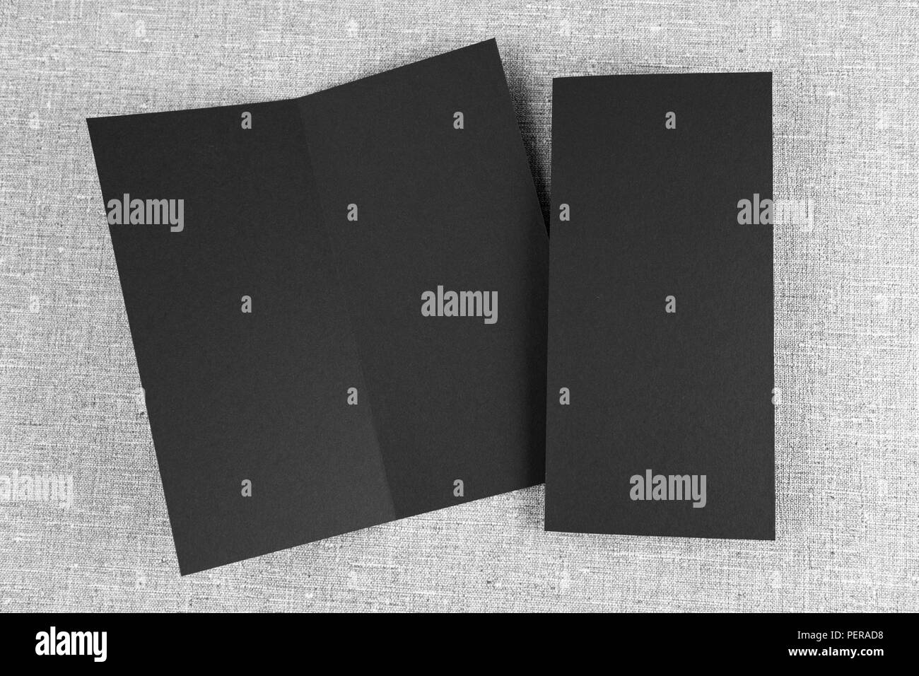 Mockup of black booklet on gray background Stock Photo - Alamy