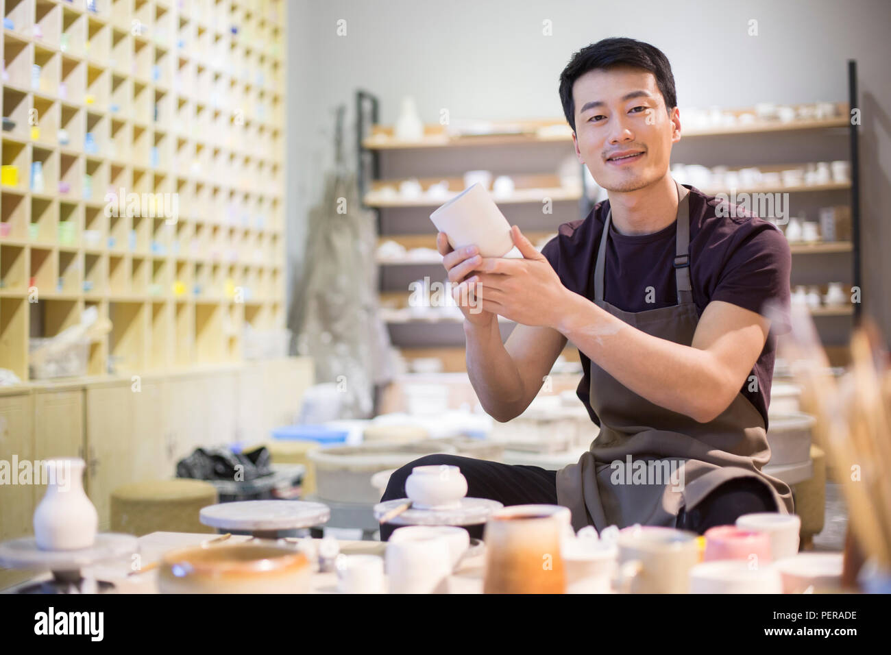 Chinese man making pottery hi-res stock photography and images - Alamy