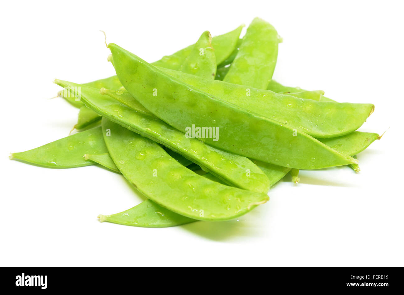 Snow peas flat green bean on white background Stock Photo - Alamy