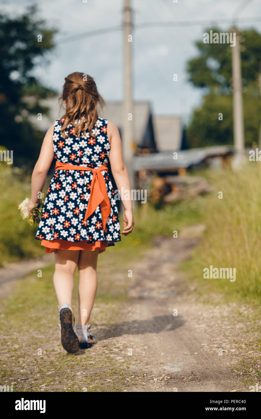 Girl walking along path in hi-res stock photography and images - Alamy