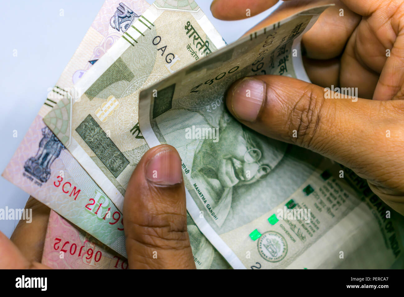 Indian bank cashier hi-res stock photography and images - Alamy