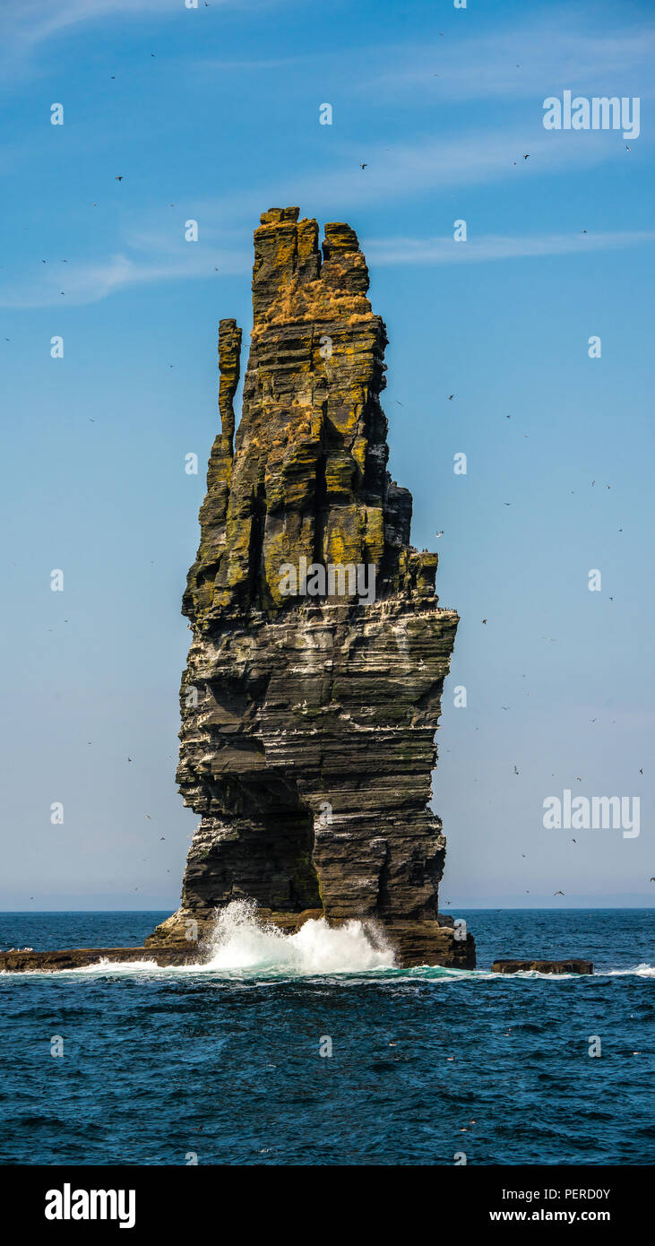 Rock tower jetting up from the sea at The Cliffs of Moher on the ...