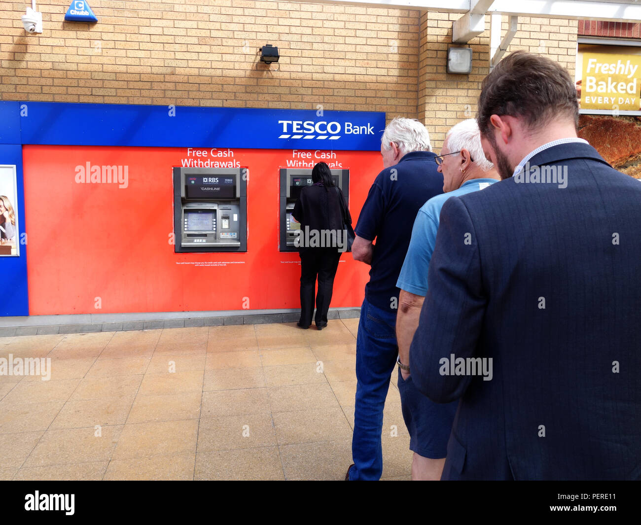 Queue People Atm High Resolution Stock Photography and Images - Alamy