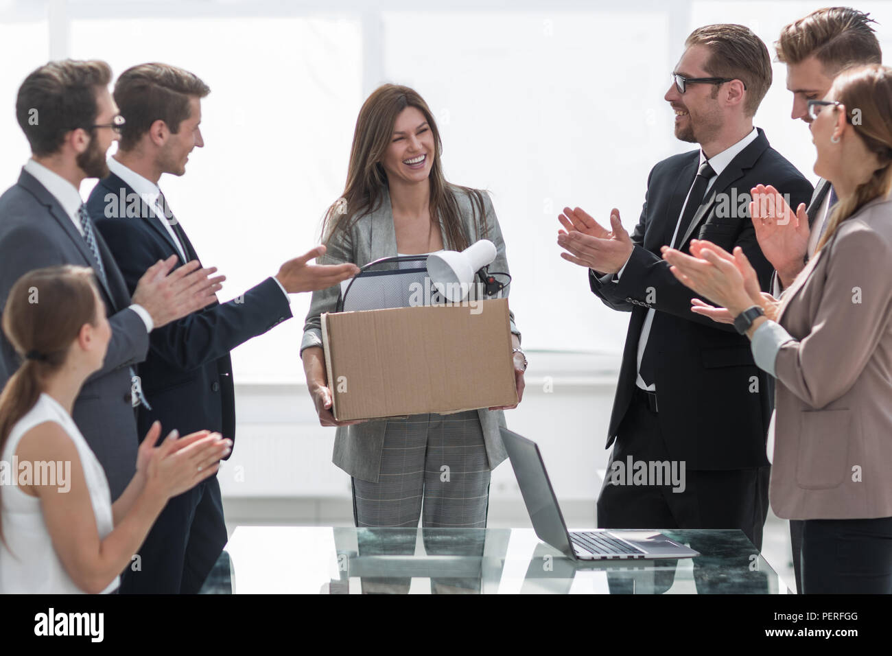 business group welcomes new employee Stock Photo - Alamy