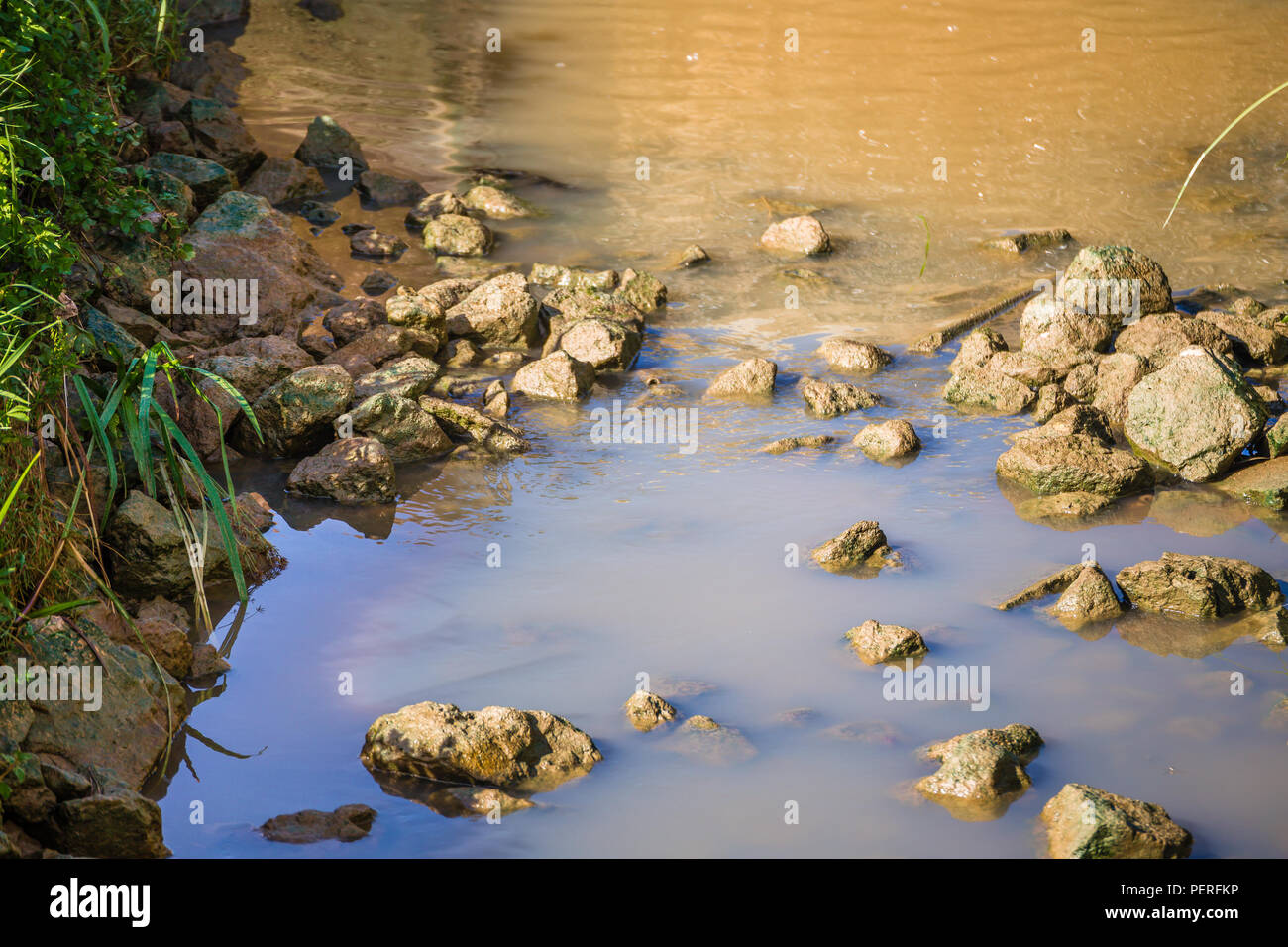stones in dry irrigation channel in countryside Stock Photo - Alamy