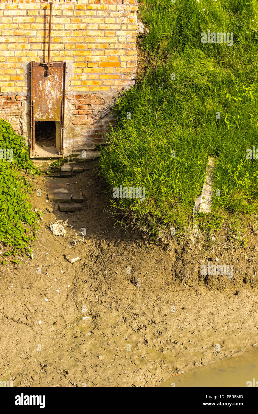 nearly dry irrigation channel in countryside Stock Photo - Alamy