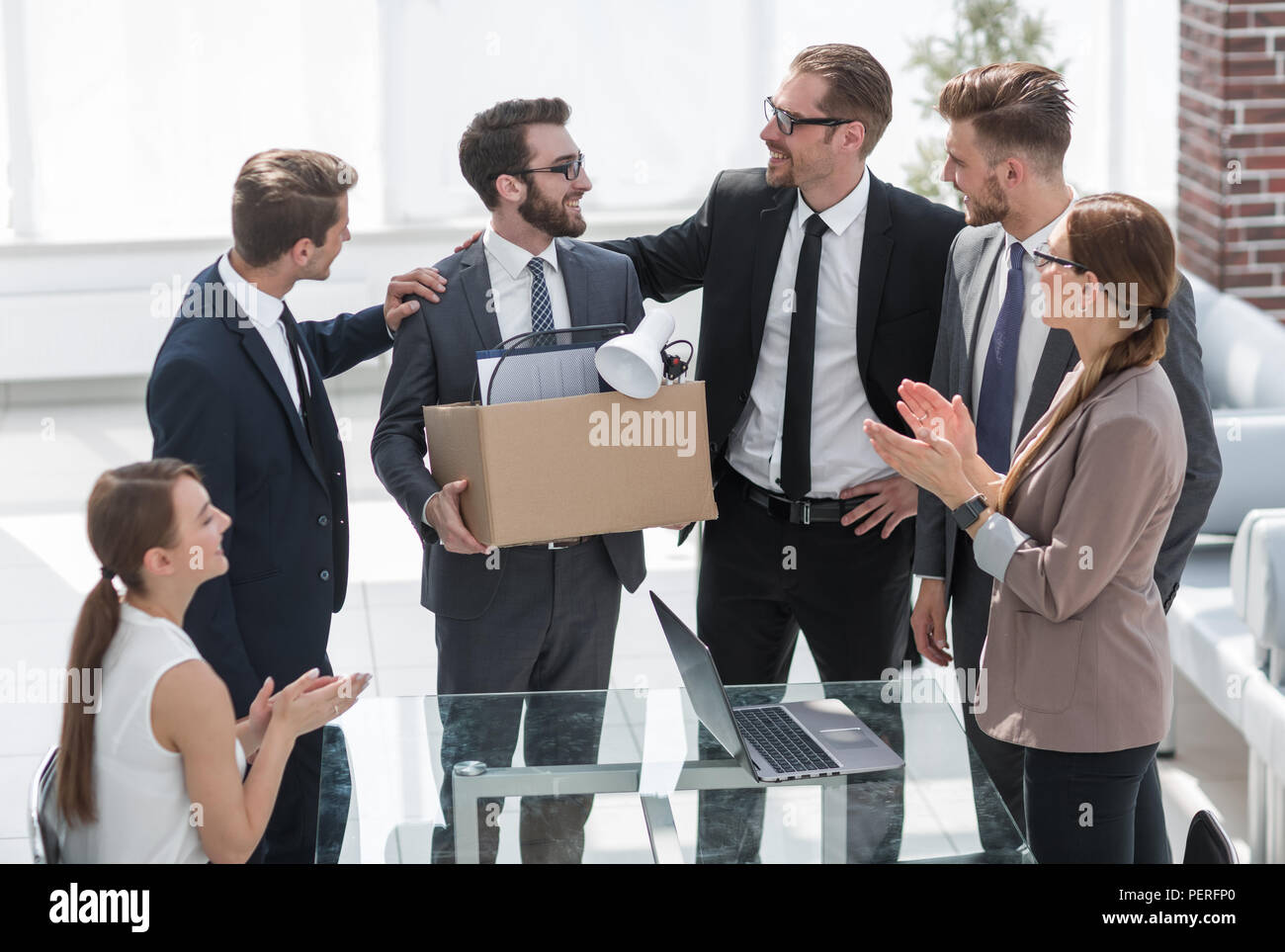HR Manager introduces a new employee to the business team Stock Photo ...