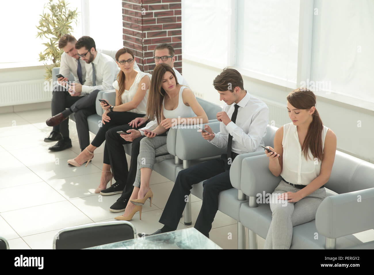 group of young people waiting for an interview Stock Photo - Alamy