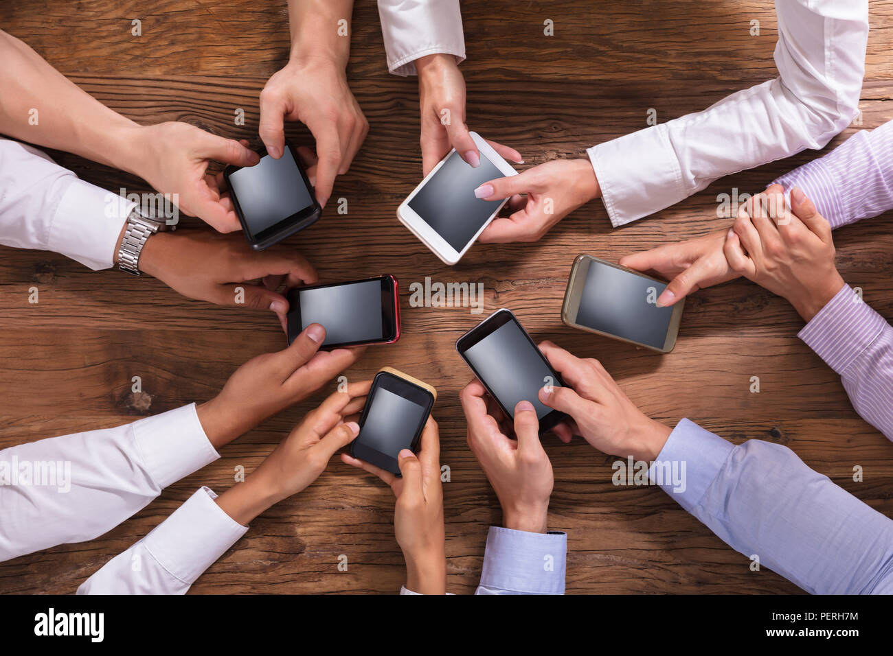 Large group of people and cell phones hi-res stock photography and ...