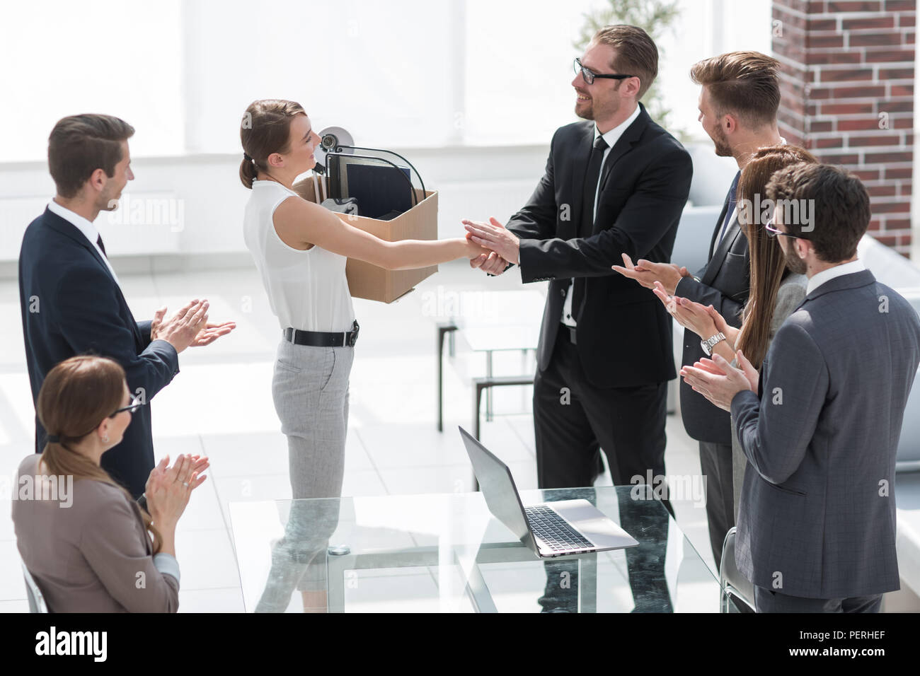 boss and the new employee shaking hands with each other Stock Photo - Alamy