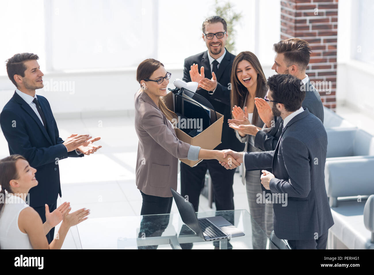 boss shaking hands with a new employee Stock Photo - Alamy