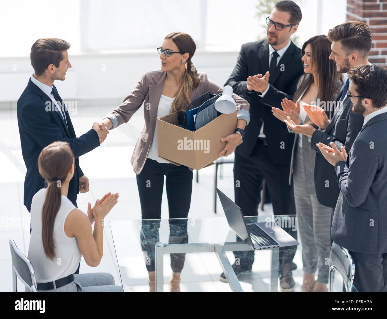 Company boss introducing new employee hi-res stock photography and ...