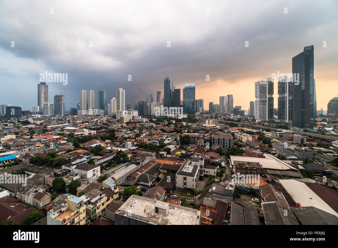 Dramatic aerial view of the sunset over the business district skyline ...
