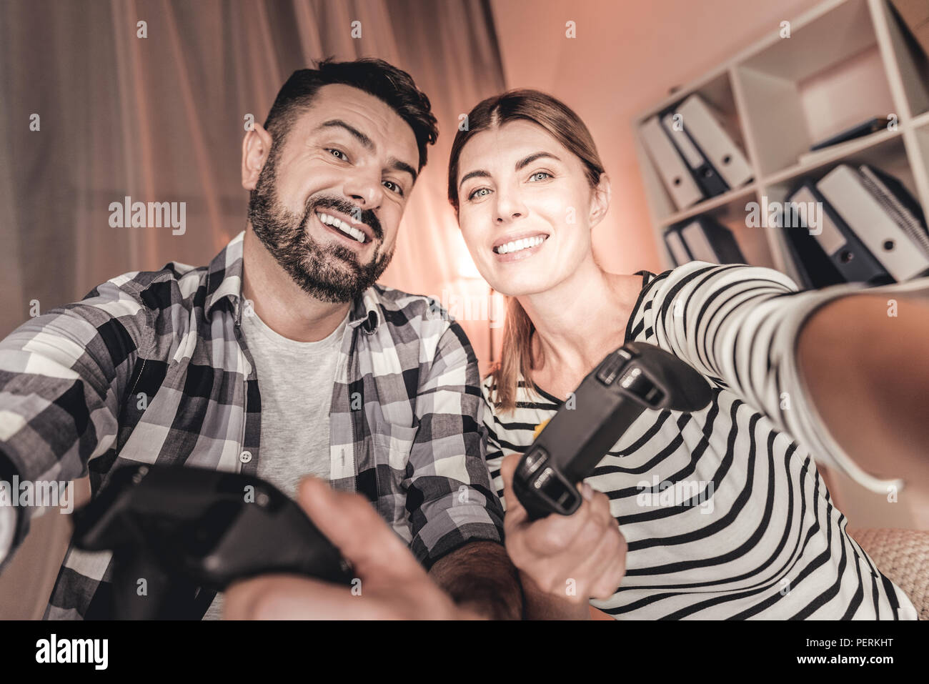 Lovely couple making selfies at home Stock Photo - Alamy