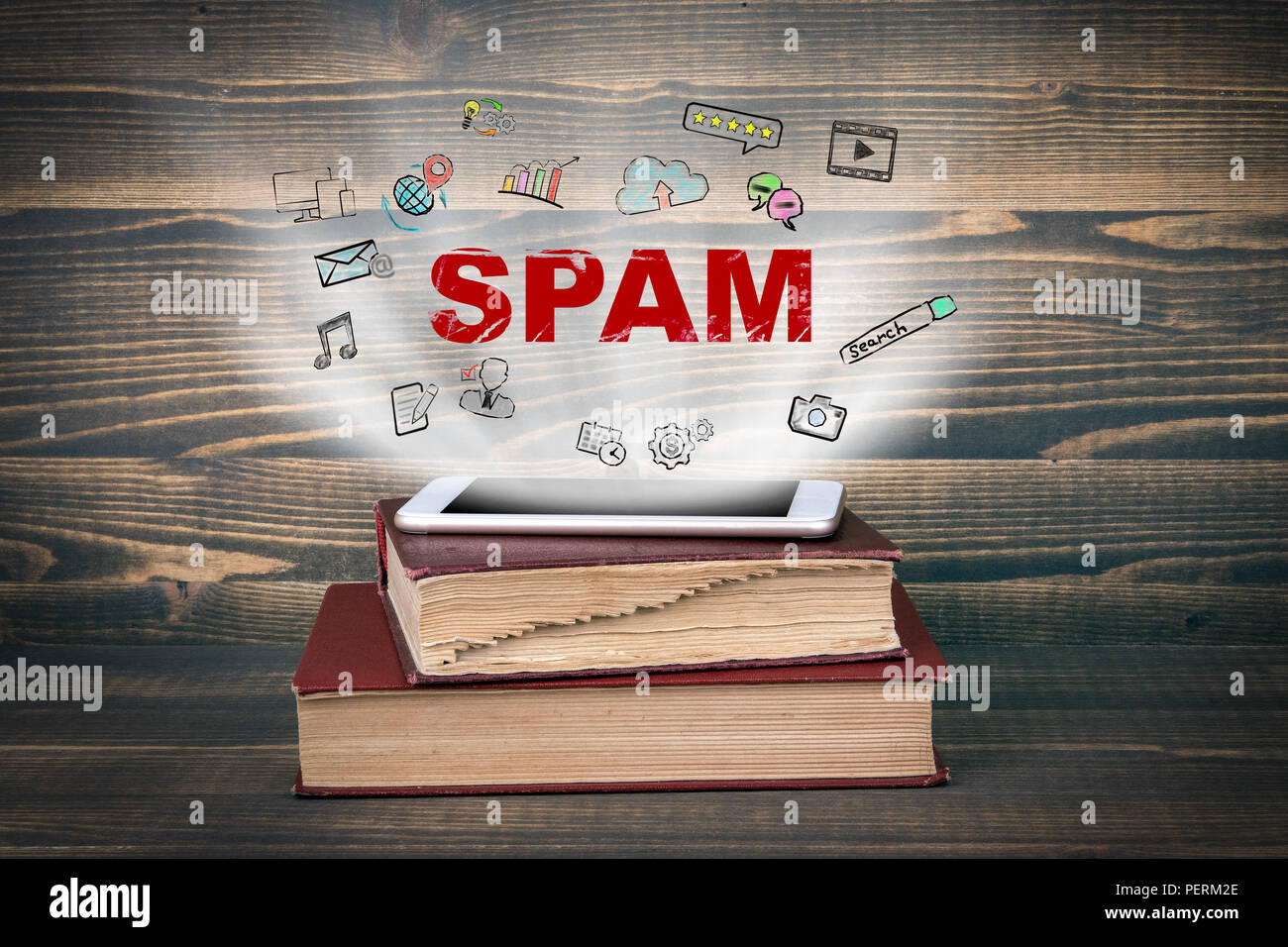 Spam. Concept cloud coming from screen of the phone Stock Photo - Alamy
