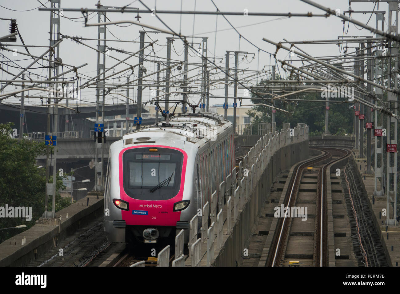 Mumbai metro train at Asalpha, Mumbai, India Stock Photo - Alamy