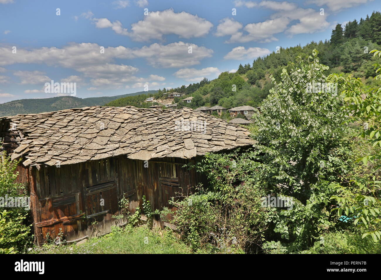 Stone house with stone fence in the Village of Leshten. Historical ...