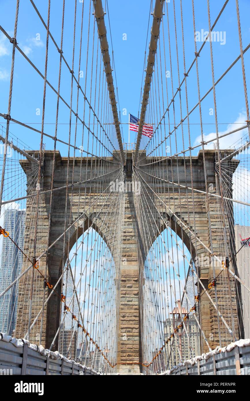 New York City, United States - famous Brooklyn Bridge with US flag ...