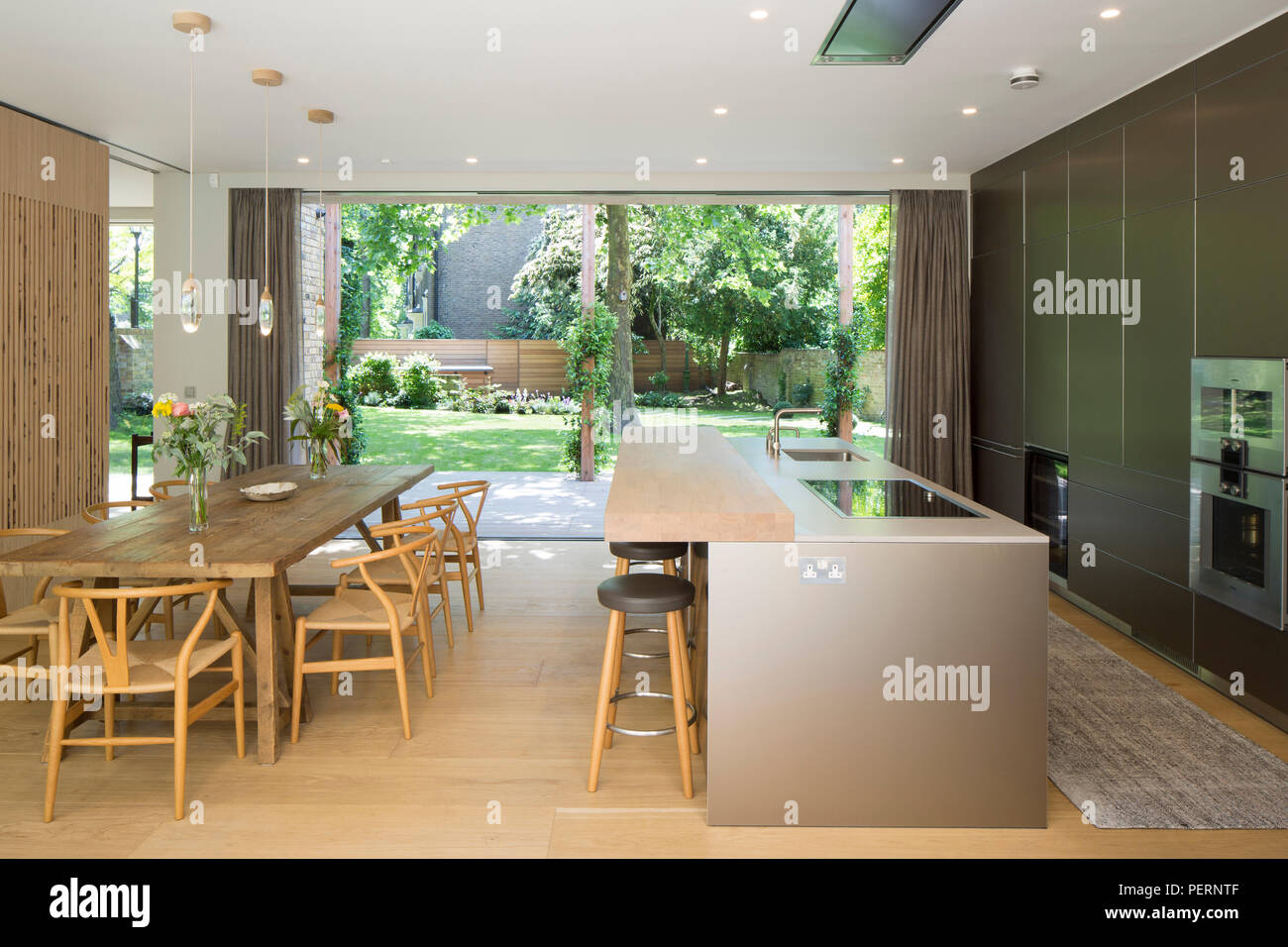 View of kitchen / dining looking through to garden. Private Residence ...