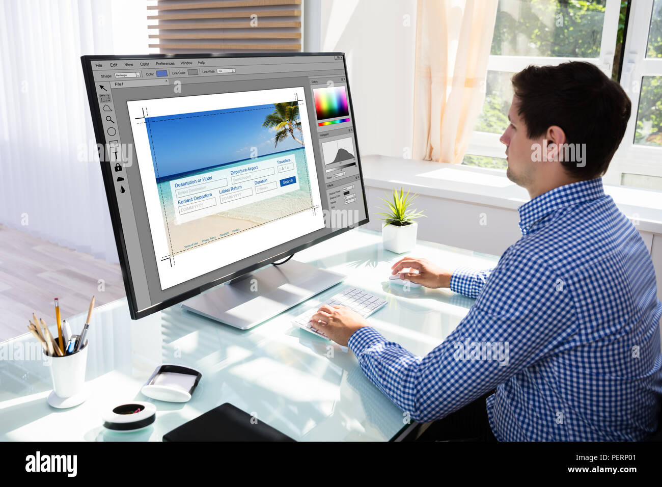 Person editing photos on computer hi-res stock photography and images ...