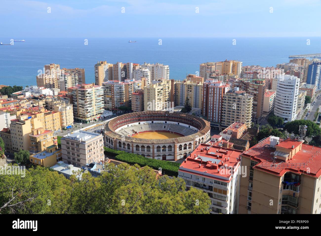 Malaga, Spain. Cityscape with hotels and bullring stadium Stock Photo ...