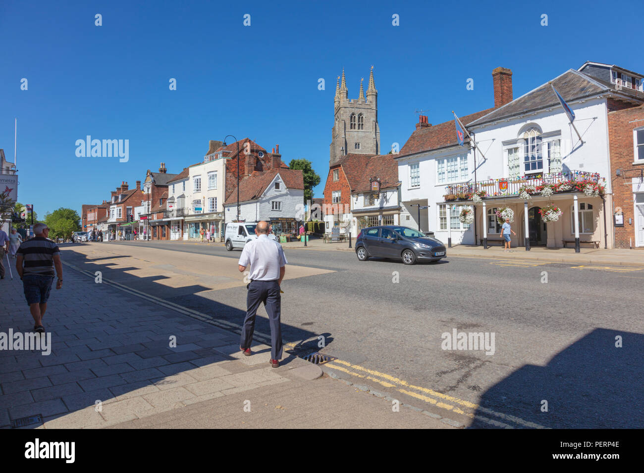 The busy town of Tenterden in Kent, the High Street with quaint shops ...