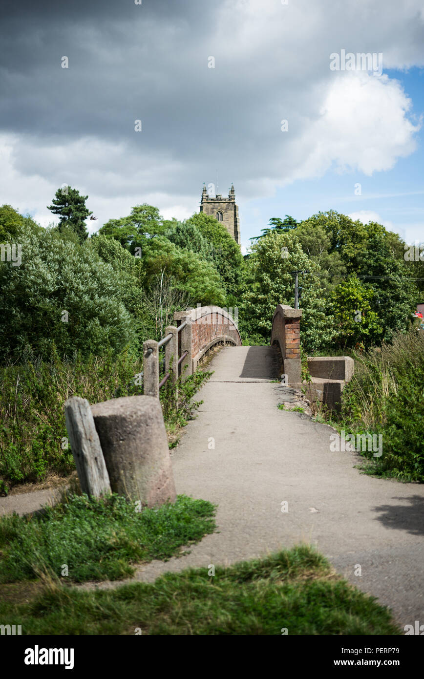 bridge to church Stock Photo - Alamy
