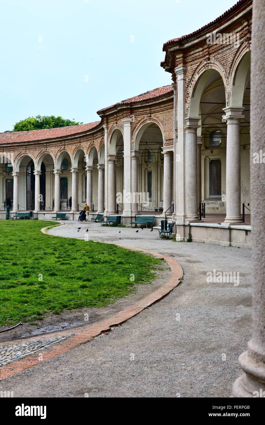 A narrow view of rotonda with many columns in view Stock Photo - Alamy