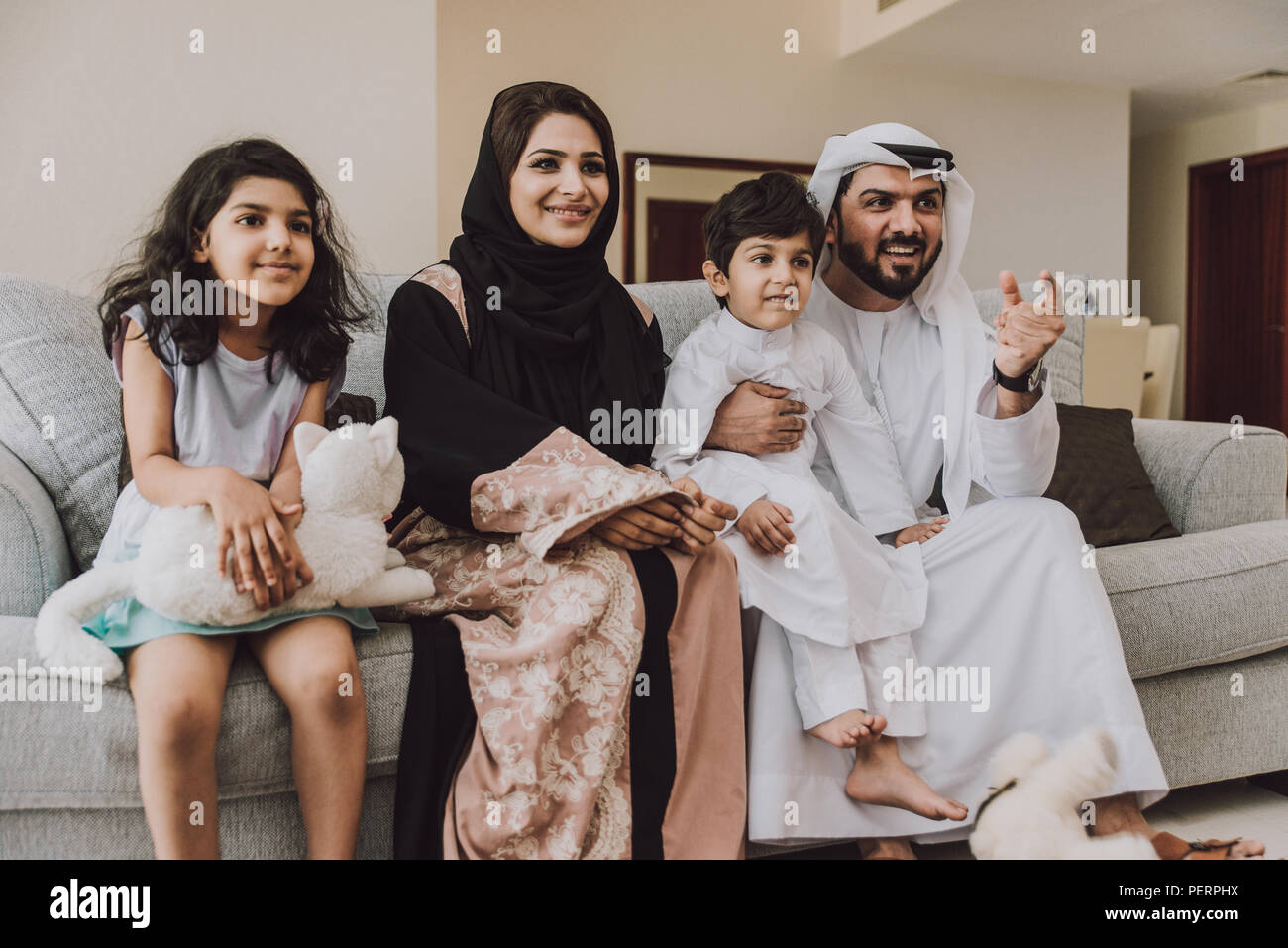 Arabic happy family lifestyle moments at home Stock Photo - Alamy