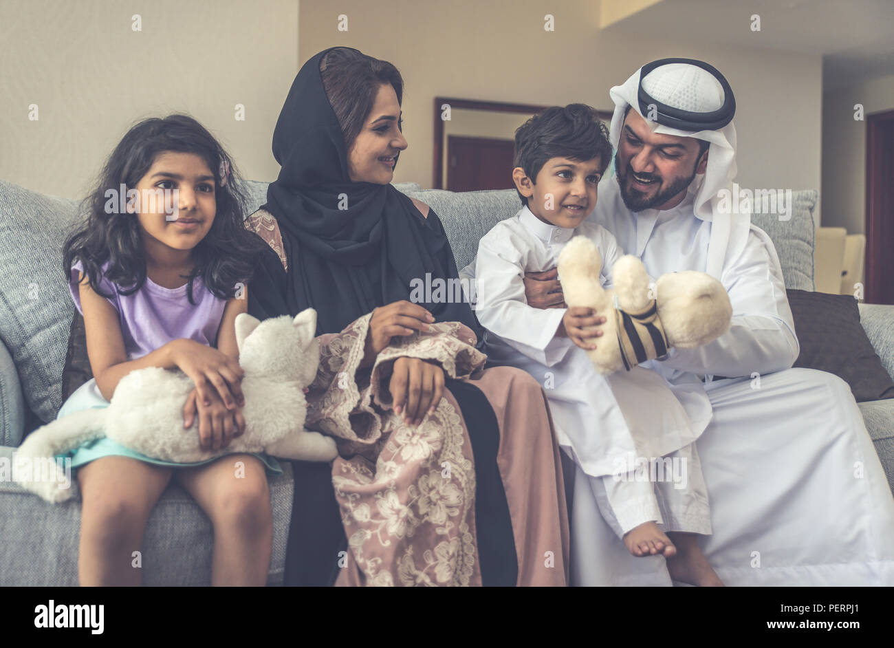 Arabic happy family lifestyle moments at home Stock Photo - Alamy