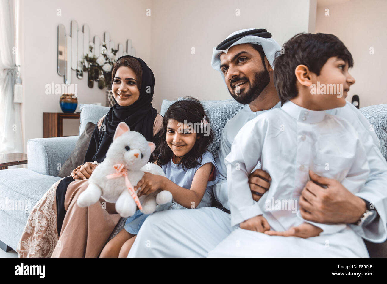 Arabic happy family lifestyle moments at home Stock Photo - Alamy
