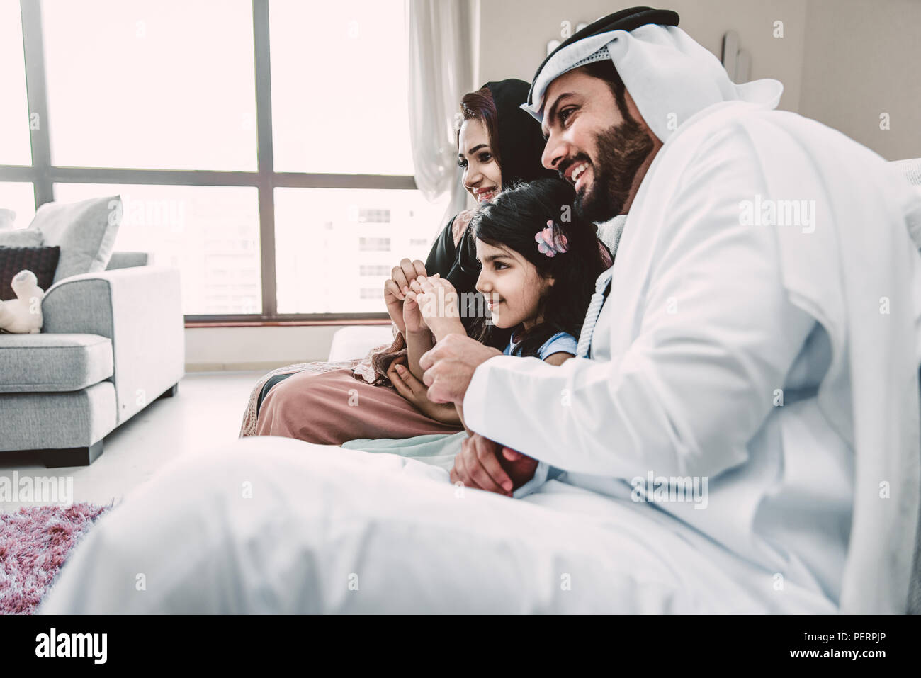 Arabic happy family lifestyle moments at home Stock Photo - Alamy