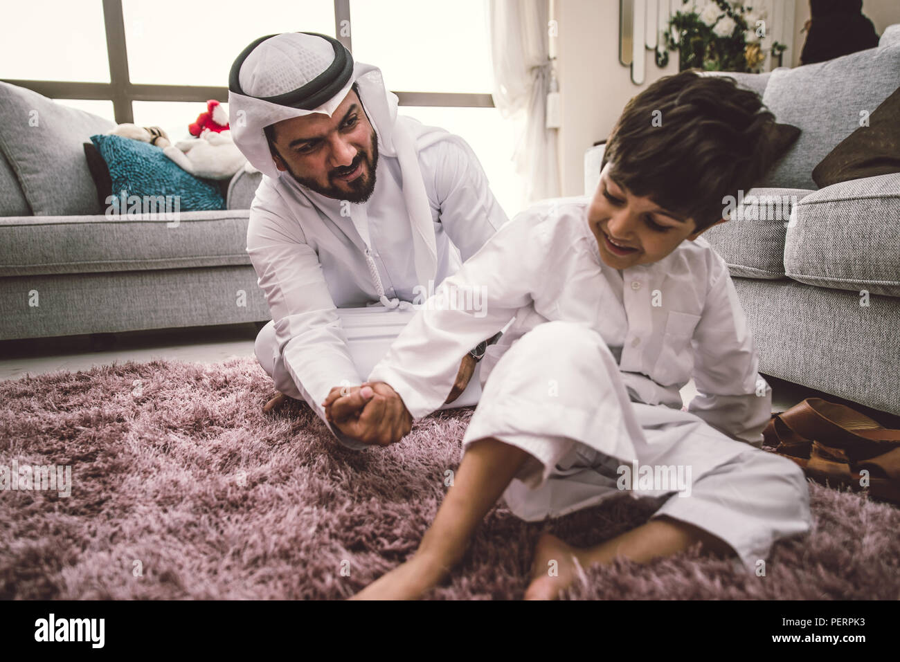Arabic happy family lifestyle moments at home Stock Photo - Alamy