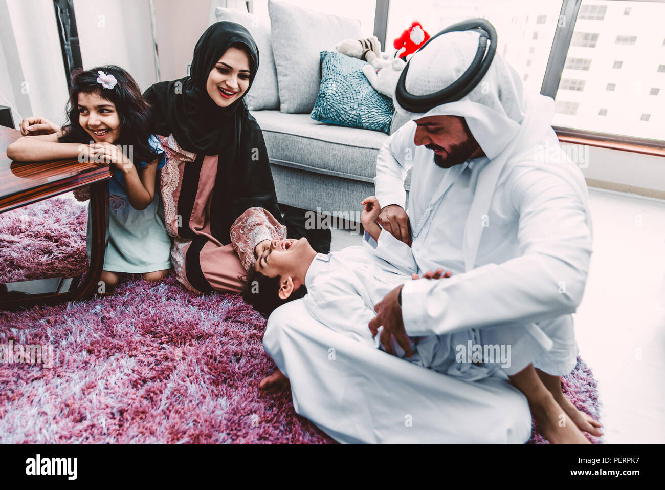 Arabic happy family lifestyle moments at home Stock Photo - Alamy