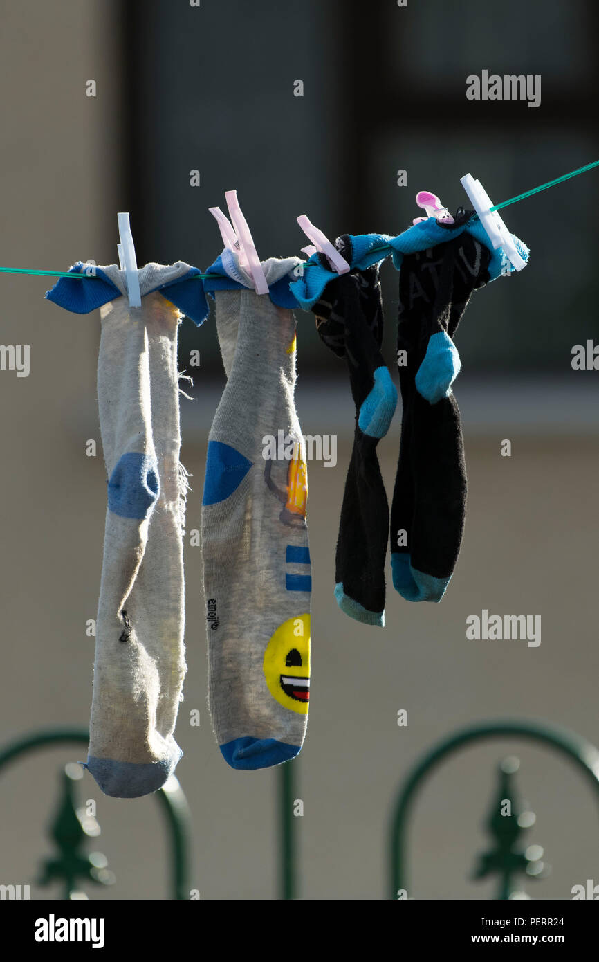 Socks On Washing Line High Resolution Stock Photography and Images - Alamy