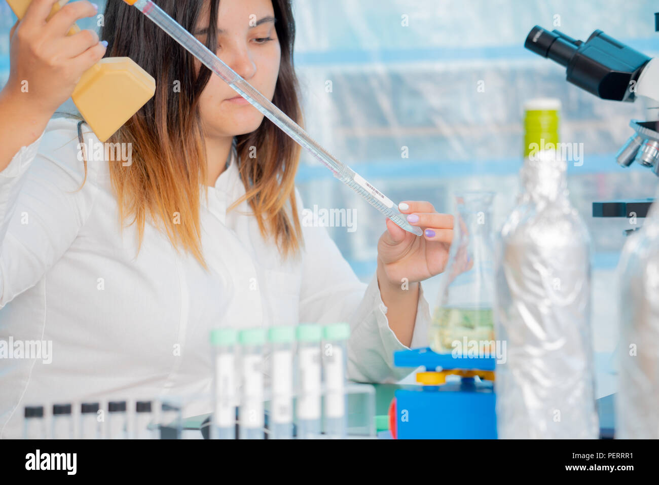 Quality control expert inspecting wine in the food laboratory Stock ...